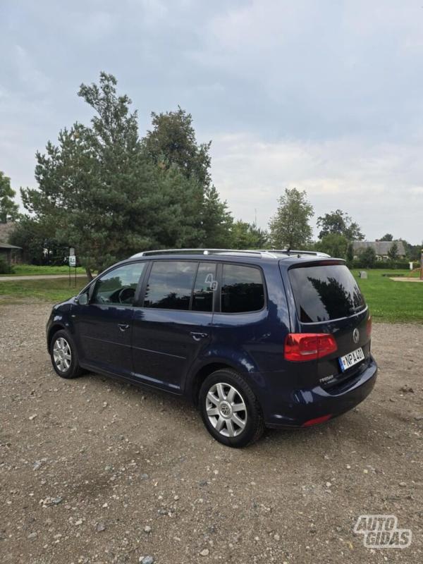 Blue Volkswagen Touran 2013 in Panevezys, with an engine capacity of 1.60 L and mileage of 284 thousand km for 5800 €, photo 5 on AUTOMOTO.COM.LV