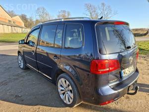 Blue Volkswagen Touran 2013 in Liepaja, with an engine capacity of 2.00 L and mileage of 274 thousand km for 7200 €, photo 3 on AUTOMOTO.COM.LV