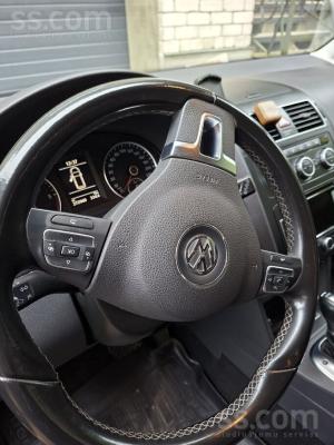 Blue Volkswagen Touran 2013 in Liepaja, with an engine capacity of 2.00 L and mileage of 274 thousand km for 7200 €, photo 13 on AUTOMOTO.COM.LV
