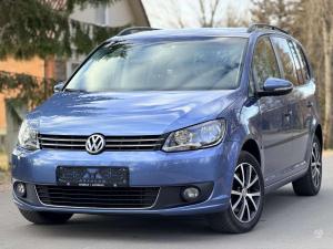 Blue Volkswagen Touran 2013 in Utena, with an engine capacity of 1.60 L and mileage of 304 thousand km for 5590 €, photo 3 on AUTOMOTO.COM.LV