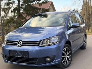 Blue Volkswagen Touran 2013 in Utena, with an engine capacity of 1.60 L and mileage of 304 thousand km for 5590 €, photo 4 on AUTOMOTO.COM.LV