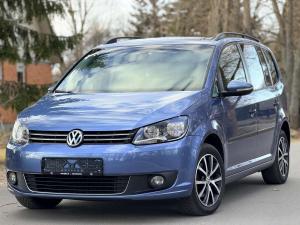 Blue Volkswagen Touran 2013 in Utena, with an engine capacity of 1.60 L and mileage of 304 thousand km for 5590 €, photo 13 on AUTOMOTO.COM.LV