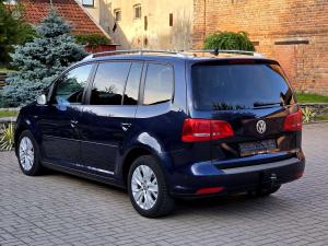 Blue Volkswagen Touran 2013 in Kedainiai, with an engine capacity of 1.97 L and mileage of 287 thousand km for 5999 €, photo 7 on AUTOMOTO.COM.LV