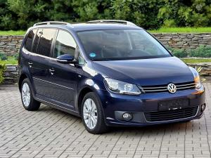 Blue Volkswagen Touran 2013 in Kedainiai, with an engine capacity of 1.97 L and mileage of 287 thousand km for 5999 €, photo 12 on AUTOMOTO.COM.LV