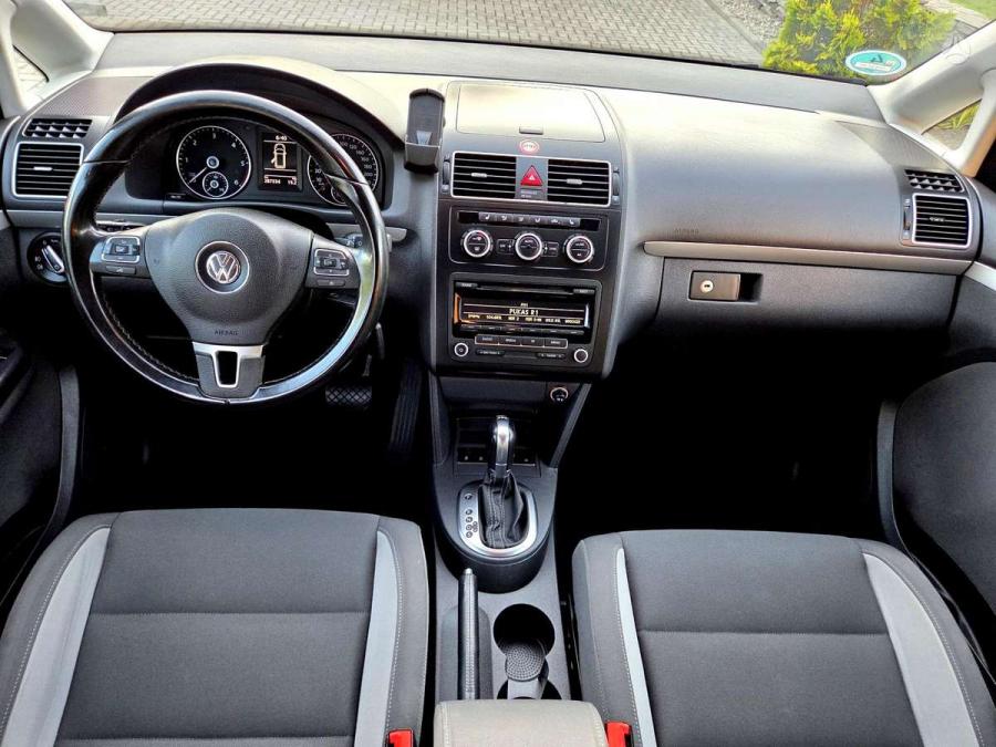 Blue Volkswagen Touran 2013 in Kedainiai, with an engine capacity of 1.97 L and mileage of 287 thousand km for 5999 €, photo 18 on AUTOMOTO.COM.LV