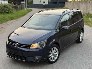 Blue Volkswagen Touran 2013 in Kedainiai, with an engine capacity of 1.97 L and mileage of 290 thousand km for 5950 €, photo  on AUTOMOTO.COM.LV