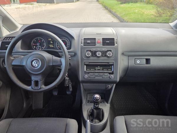Blue Volkswagen Touran 2013 in Riga, with an engine capacity of 1.60 L and mileage of 365 thousand km for 3290 €, photo 7 on AUTOMOTO.COM.LV