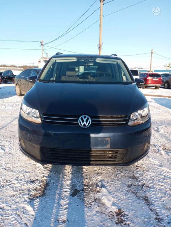 Blue Volkswagen Touran 2014 in Kaunas, with an engine capacity of 1.40 L and mileage of 160 thousand km for 4800 €, photo 2 on AUTOMOTO.COM.LV