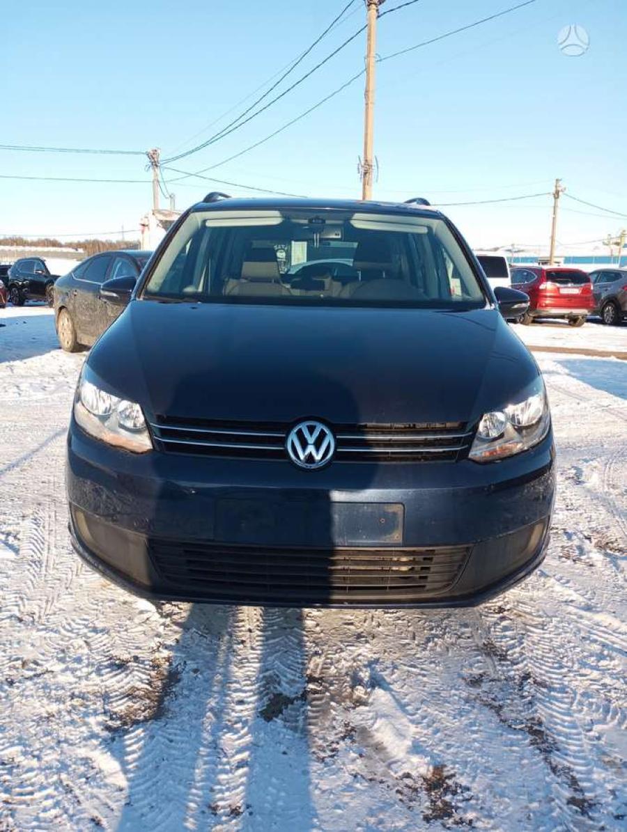 Blue Volkswagen Touran 2014 in Kaunas, with an engine capacity of 1.40 L and mileage of 160 thousand km for 4800 €, photo 2 on AUTOMOTO.COM.LV