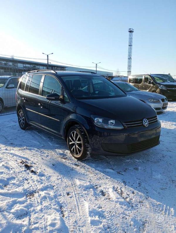 Blue Volkswagen Touran 2014 in Kaunas, with an engine capacity of 1.40 L and mileage of 160 thousand km for 4800 €, photo 4 on AUTOMOTO.COM.LV