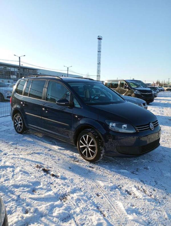 Blue Volkswagen Touran 2014 in Kaunas, with an engine capacity of 1.40 L and mileage of 160 thousand km for 4800 €, photo 5 on AUTOMOTO.COM.LV