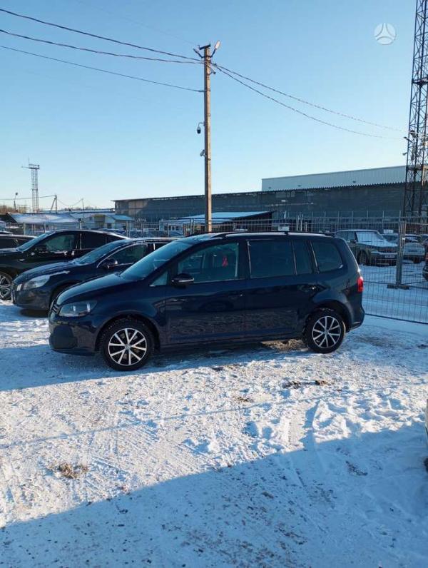 Blue Volkswagen Touran 2014 in Kaunas, with an engine capacity of 1.40 L and mileage of 160 thousand km for 4800 €, photo 6 on AUTOMOTO.COM.LV
