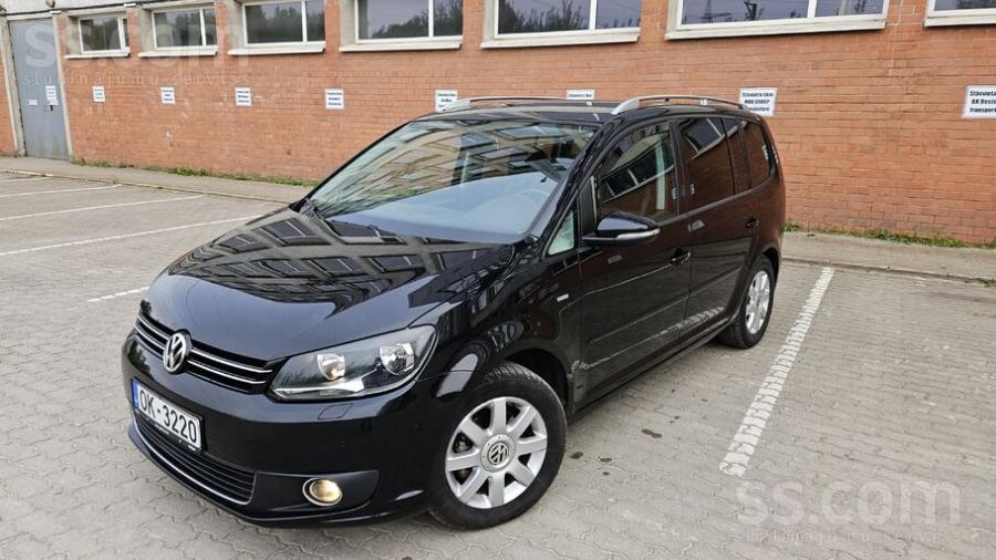 Blue Volkswagen Touran 2014 in Riga, with an engine capacity of 1.60 L and mileage of 290 thousand km for 5200 €, photo 1 on AUTOMOTO.COM.LV