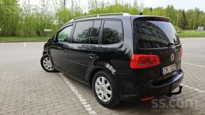 Blue Volkswagen Touran 2014 in Riga, with an engine capacity of 1.60 L and mileage of 290 thousand km for 5200 €, photo 5 on AUTOMOTO.COM.LV
