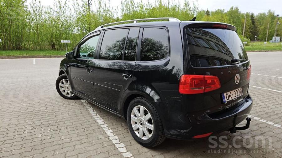 Blue Volkswagen Touran 2014 in Riga, with an engine capacity of 1.60 L and mileage of 290 thousand km for 5200 €, photo 5 on AUTOMOTO.COM.LV
