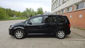 Blue Volkswagen Touran 2014 in Riga, with an engine capacity of 1.60 L and mileage of 290 thousand km for 5200 €, photo 7 on AUTOMOTO.COM.LV