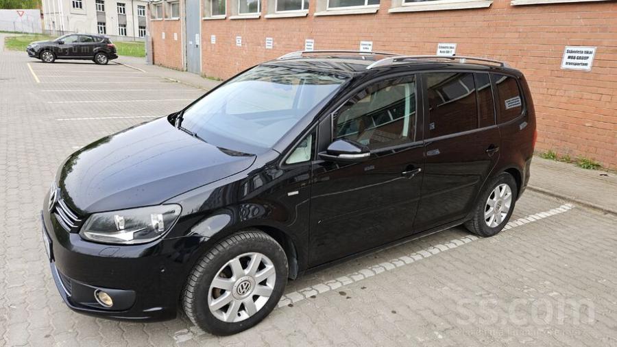 Blue Volkswagen Touran 2014 in Riga, with an engine capacity of 1.60 L and mileage of 290 thousand km for 5200 €, photo 8 on AUTOMOTO.COM.LV