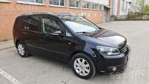 Blue Volkswagen Touran 2014 in Riga, with an engine capacity of 1.60 L and mileage of 290 thousand km for 5200 €, photo 9 on AUTOMOTO.COM.LV