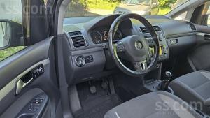 Blue Volkswagen Touran 2014 in Riga, with an engine capacity of 1.60 L and mileage of 290 thousand km for 5200 €, photo 10 on AUTOMOTO.COM.LV