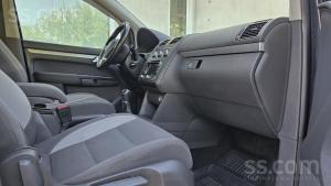 Blue Volkswagen Touran 2014 in Riga, with an engine capacity of 1.60 L and mileage of 290 thousand km for 5200 €, photo 11 on AUTOMOTO.COM.LV