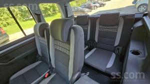 Blue Volkswagen Touran 2014 in Riga, with an engine capacity of 1.60 L and mileage of 290 thousand km for 5200 €, photo 14 on AUTOMOTO.COM.LV