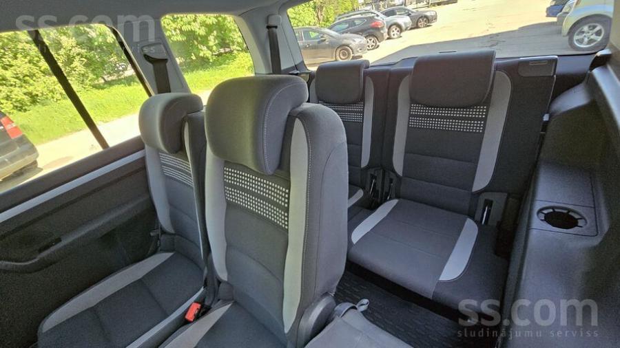 Blue Volkswagen Touran 2014 in Riga, with an engine capacity of 1.60 L and mileage of 290 thousand km for 5200 €, photo 14 on AUTOMOTO.COM.LV