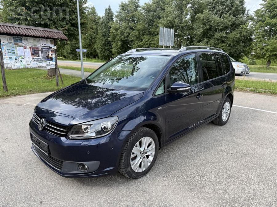 Blue Volkswagen Touran 2014 in Ogre, with an engine capacity of 1.60 L and mileage of 188 thousand km for 8199 €, photo 1 on AUTOMOTO.COM.LV