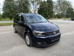 Blue Volkswagen Touran 2014 in Ogre, with an engine capacity of 1.60 L and mileage of 188 thousand km for 8199 €, photo 3 on AUTOMOTO.COM.LV