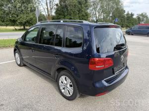 Blue Volkswagen Touran 2014 in Ogre, with an engine capacity of 1.60 L and mileage of 188 thousand km for 8199 €, photo 6 on AUTOMOTO.COM.LV