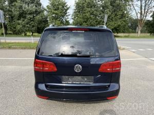 Blue Volkswagen Touran 2014 in Ogre, with an engine capacity of 1.60 L and mileage of 188 thousand km for 8199 €, photo 7 on AUTOMOTO.COM.LV