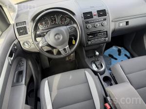 Blue Volkswagen Touran 2014 in Ogre, with an engine capacity of 1.60 L and mileage of 188 thousand km for 8199 €, photo 9 on AUTOMOTO.COM.LV