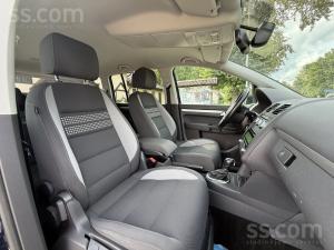 Blue Volkswagen Touran 2014 in Ogre, with an engine capacity of 1.60 L and mileage of 188 thousand km for 8199 €, photo 11 on AUTOMOTO.COM.LV