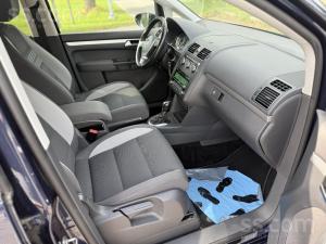 Blue Volkswagen Touran 2014 in Ogre, with an engine capacity of 1.60 L and mileage of 188 thousand km for 8199 €, photo 12 on AUTOMOTO.COM.LV