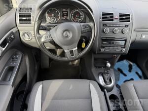 Blue Volkswagen Touran 2014 in Ogre, with an engine capacity of 1.60 L and mileage of 188 thousand km for 8199 €, photo 15 on AUTOMOTO.COM.LV