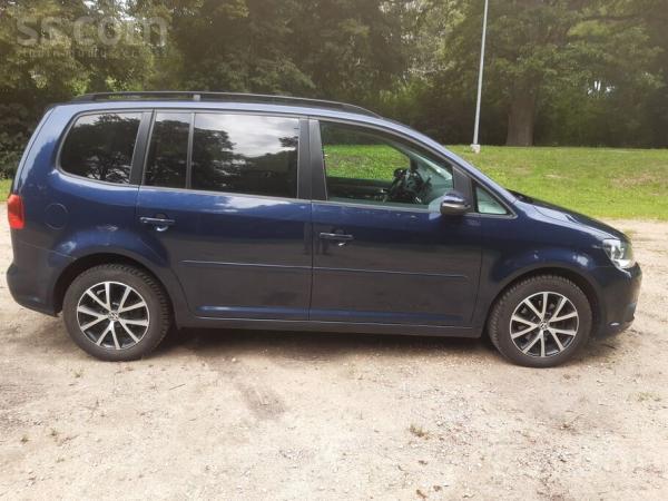 Zils Volkswagen Touran 2014 Rīga, ar dzinēja tilpumu 1.60 L un nobraukumu 306 tūkst. km par 4700 €, foto 3 vietnē AUTOMOTO.COM.LV