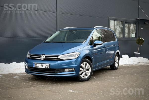 Blue Volkswagen Touran 2015 in Riga, with an engine capacity of 1.60 L and mileage of 218 thousand km for 13900 €, photo 1 on AUTOMOTO.COM.LV