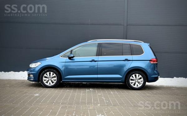 Blue Volkswagen Touran 2015 in Riga, with an engine capacity of 1.60 L and mileage of 218 thousand km for 13900 €, photo 2 on AUTOMOTO.COM.LV