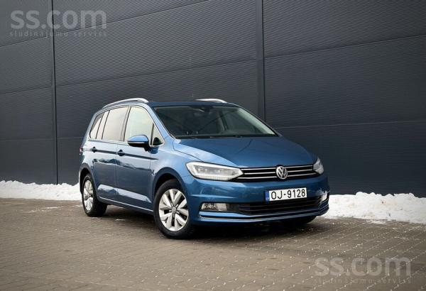 Blue Volkswagen Touran 2015 in Riga, with an engine capacity of 1.60 L and mileage of 218 thousand km for 13900 €, photo 4 on AUTOMOTO.COM.LV