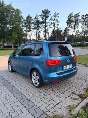 Blue Volkswagen Touran 2015 in Riga, with an engine capacity of 1.60 L and mileage of 210 thousand km for 6950 €, photo 3 on AUTOMOTO.COM.LV