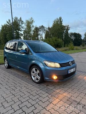 Blue Volkswagen Touran 2015 in Riga, with an engine capacity of 1.60 L and mileage of 210 thousand km for 6950 €, photo 5 on AUTOMOTO.COM.LV