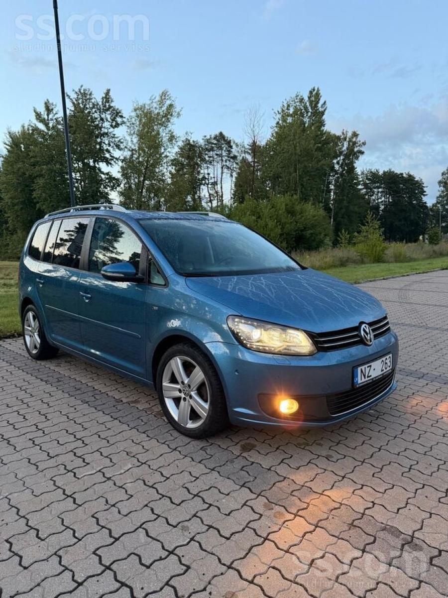 Blue Volkswagen Touran 2015 in Riga, with an engine capacity of 1.60 L and mileage of 210 thousand km for 6950 €, photo 5 on AUTOMOTO.COM.LV