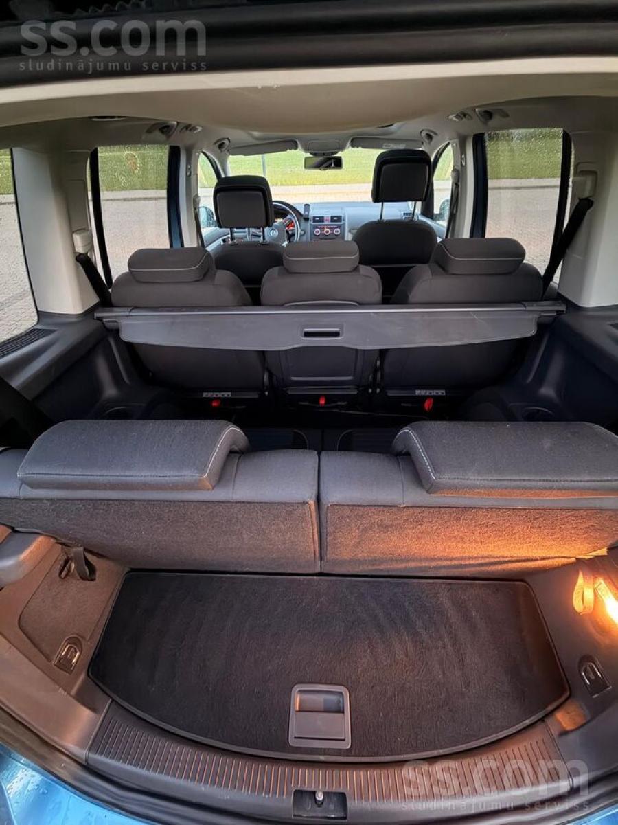 Blue Volkswagen Touran 2015 in Riga, with an engine capacity of 1.60 L and mileage of 210 thousand km for 6950 €, photo 6 on AUTOMOTO.COM.LV