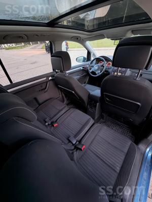 Blue Volkswagen Touran 2015 in Riga, with an engine capacity of 1.60 L and mileage of 210 thousand km for 6950 €, photo 7 on AUTOMOTO.COM.LV