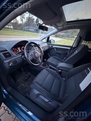 Blue Volkswagen Touran 2015 in Riga, with an engine capacity of 1.60 L and mileage of 210 thousand km for 6950 €, photo 8 on AUTOMOTO.COM.LV