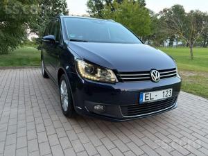 Blue Volkswagen Touran 2015 in Jelgava, with an engine capacity of 1.60 L and mileage of 280 thousand km for 8200 €, photo 3 on AUTOMOTO.COM.LV