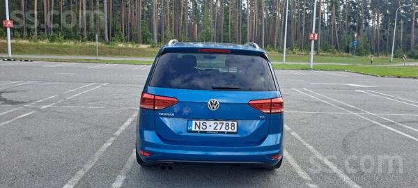 Blue Volkswagen Touran 2015 in Riga, with an engine capacity of 1.40 L and mileage of 147 thousand km for 12500 €, photo 2 on AUTOMOTO.COM.LV
