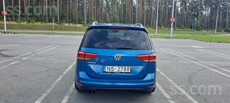 Blue Volkswagen Touran 2015 in Riga, with an engine capacity of 1.40 L and mileage of 147 thousand km for 12500 €, photo 3 on AUTOMOTO.COM.LV