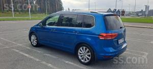 Blue Volkswagen Touran 2015 in Riga, with an engine capacity of 1.40 L and mileage of 147 thousand km for 12500 €, photo 4 on AUTOMOTO.COM.LV