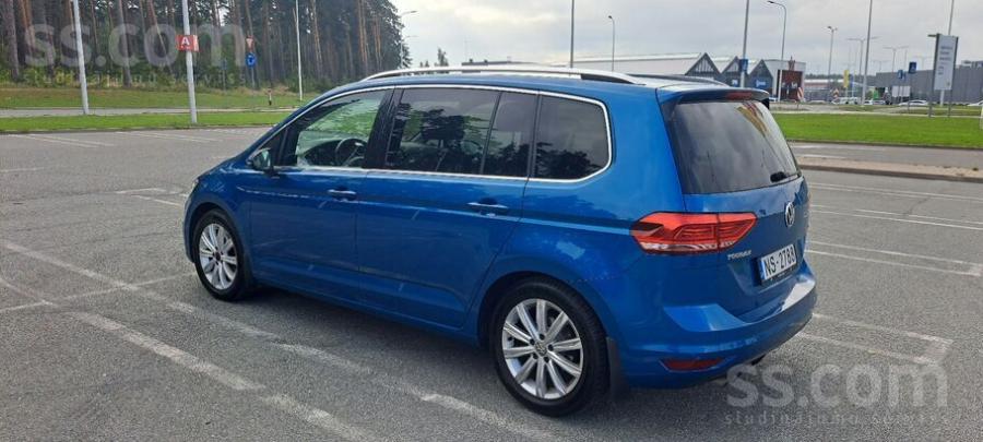 Blue Volkswagen Touran 2015 in Riga, with an engine capacity of 1.40 L and mileage of 147 thousand km for 12500 €, photo 4 on AUTOMOTO.COM.LV