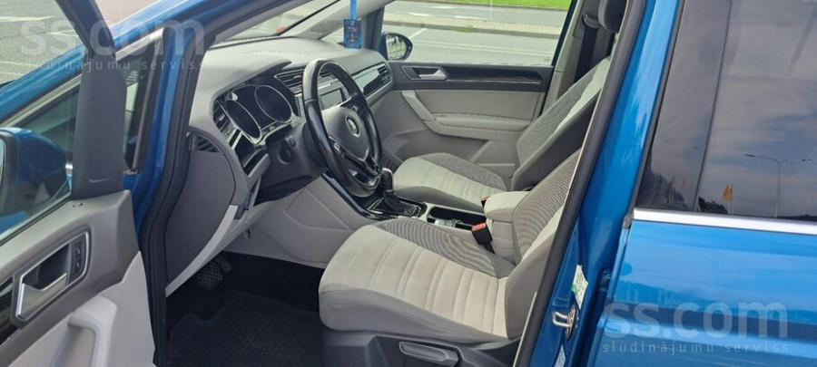 Blue Volkswagen Touran 2015 in Riga, with an engine capacity of 1.40 L and mileage of 147 thousand km for 12500 €, photo 6 on AUTOMOTO.COM.LV